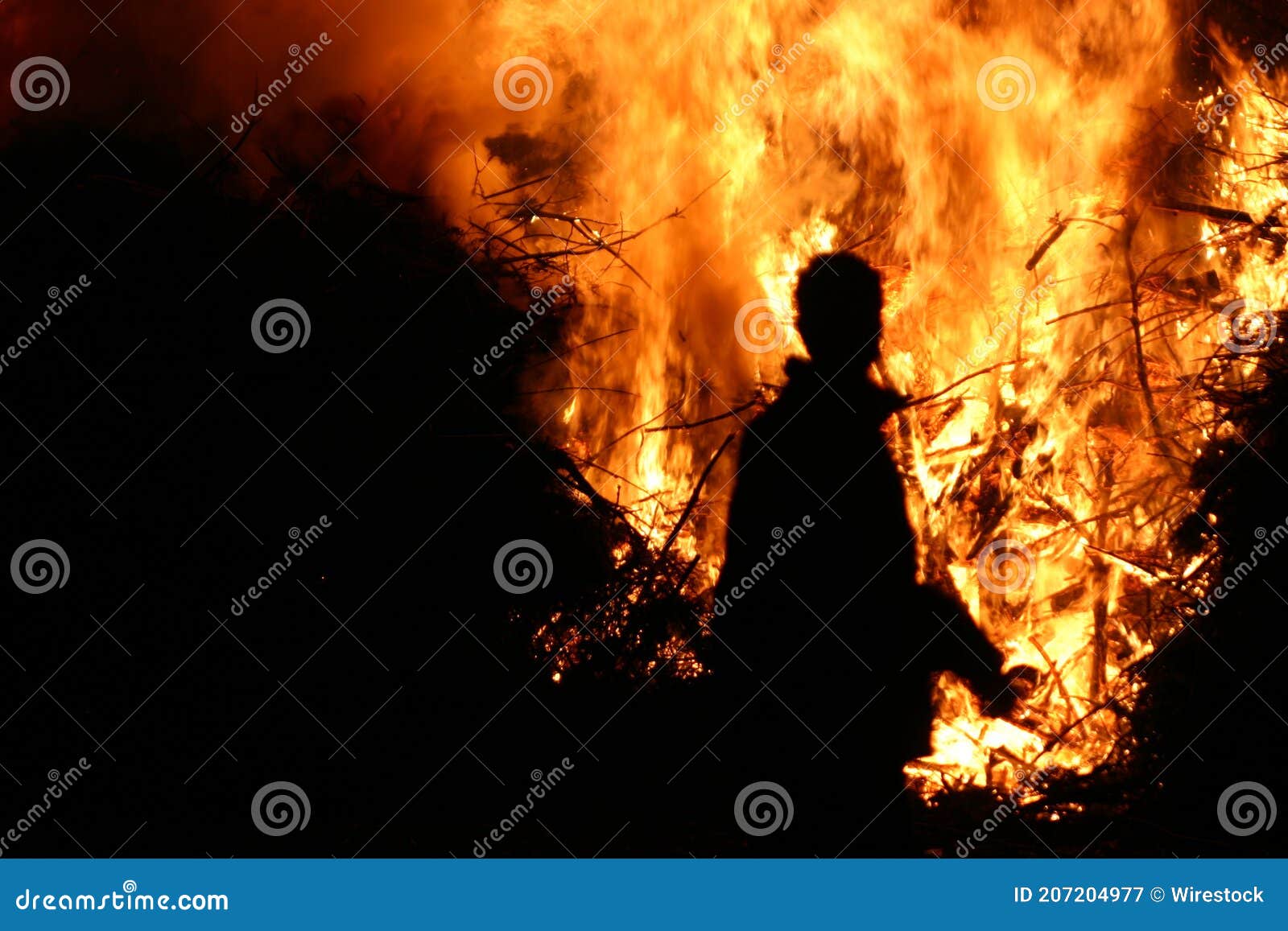 Shape of Human Watching Trees and Bushes on Huge Fire - Horror Concept ...