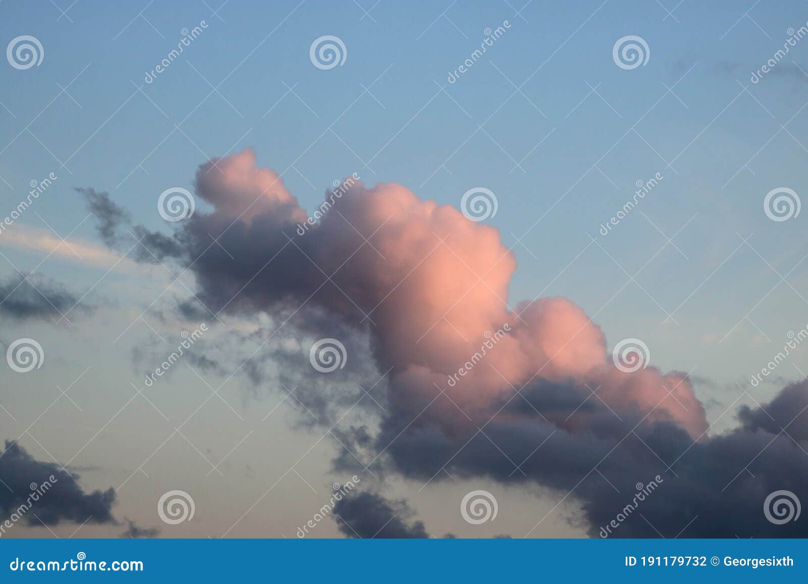 Shapes of Clouds Tinged Pink by Approaching Sunset Stock Photo - Image ...