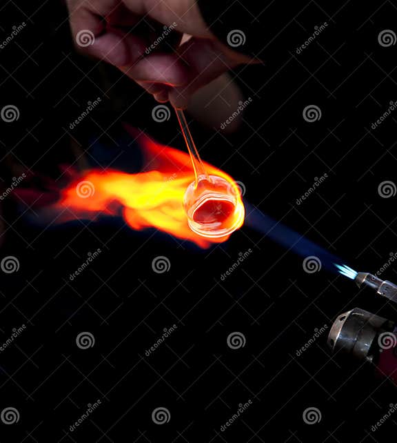 Shaping glass in fire stock photo. Image of form, melt - 19421434