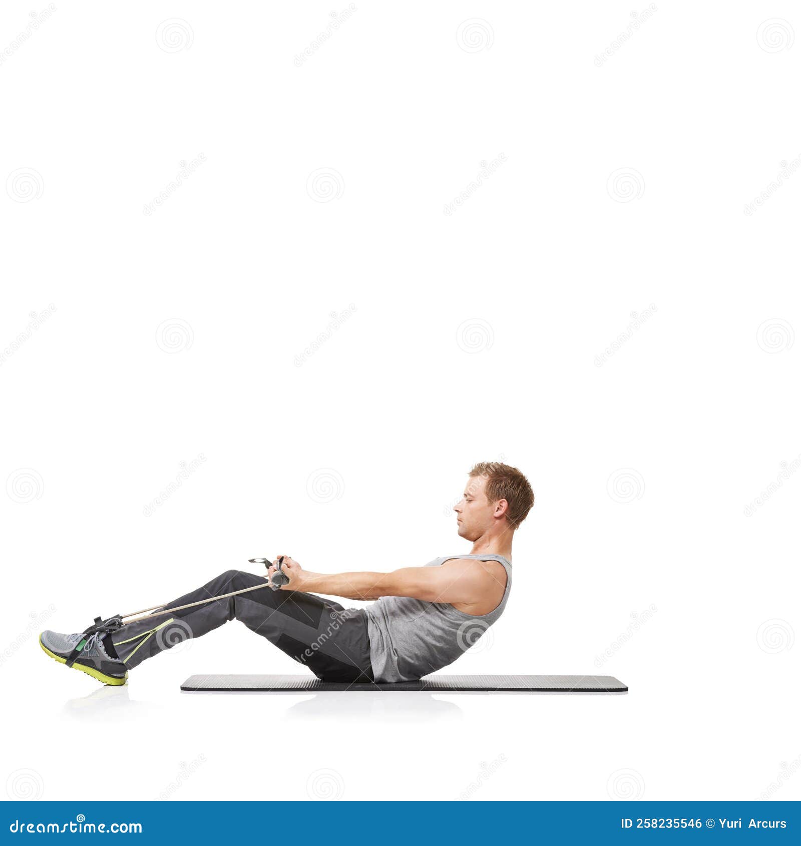 Shaping His Muscles. a Young Man Doing Some Resistance Training. Stock ...