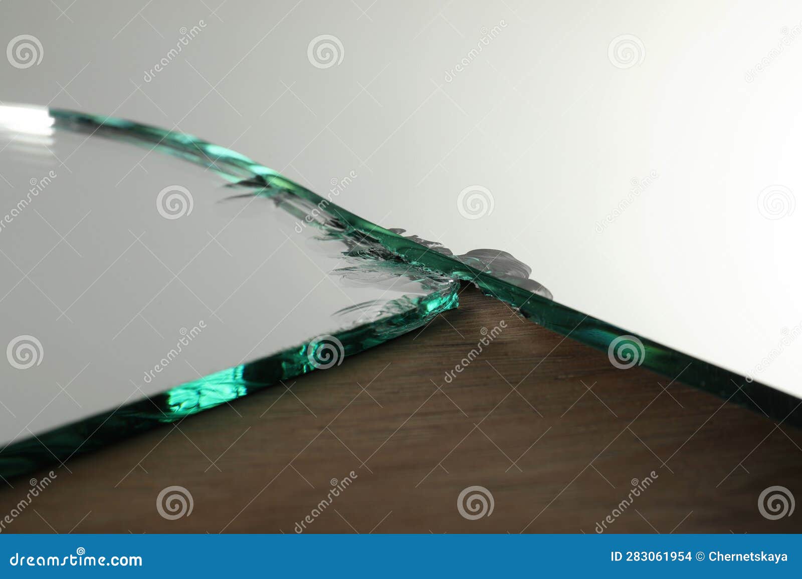 Shard of Broken Mirror on Wooden Backing Board, Closeup Stock Photo ...