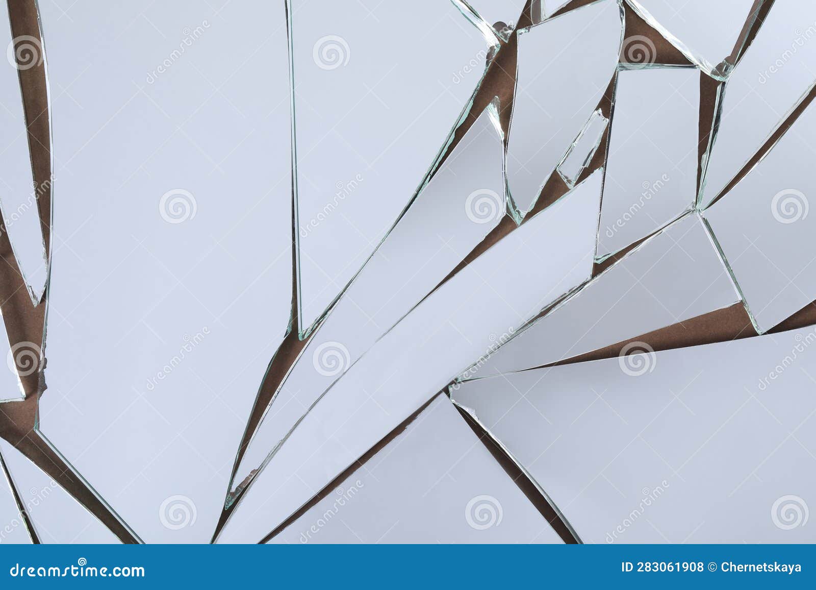 Shards of Broken Mirror on Backing Board, Top View Stock Photo - Image ...