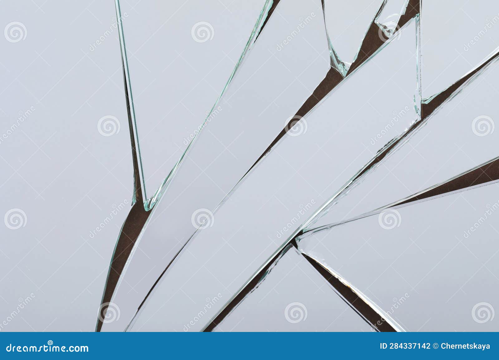 Shards of Broken Mirror on Backing Board, Top View Stock Photo - Image ...