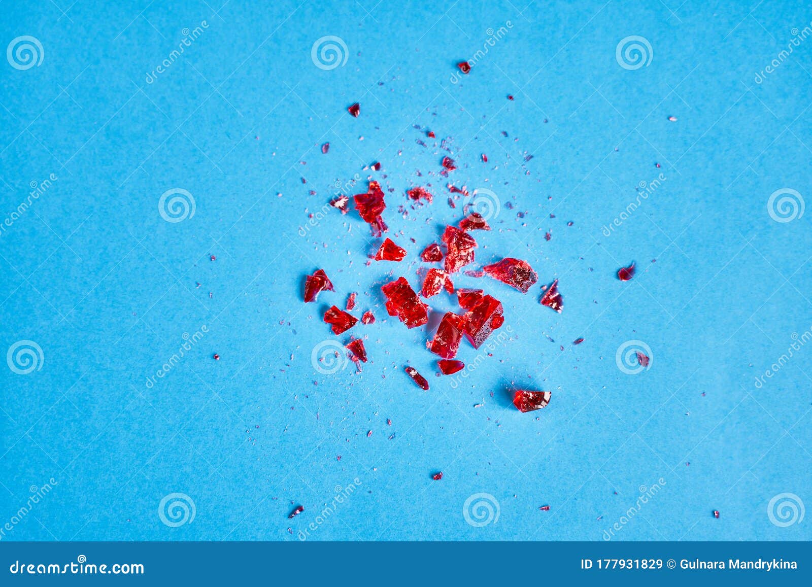 Shards of Red Glass on a Blue Background Stock Image - Image of city ...