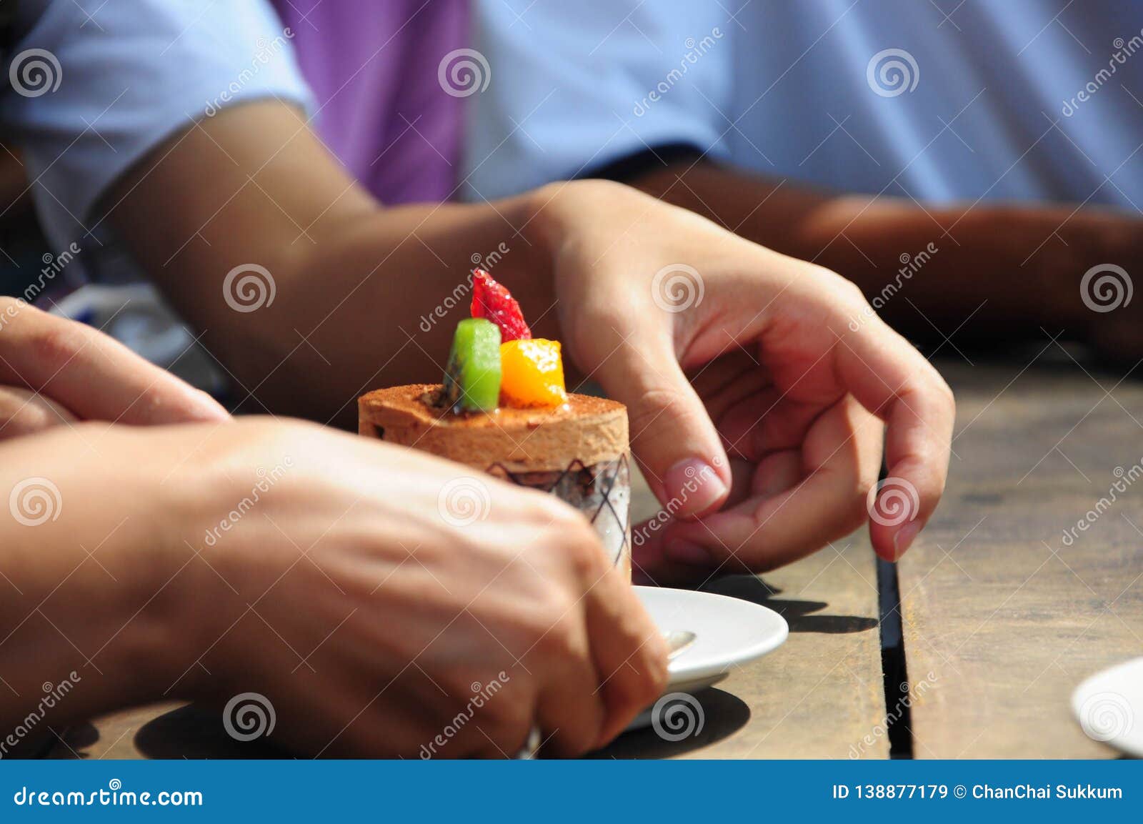 Share eating fruit cake stock image. Image of black - 138877179