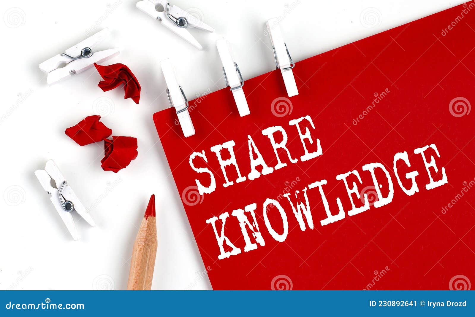 SHARE KNOWLEDGE Text on Red Paper with Office Tools on White Background ...
