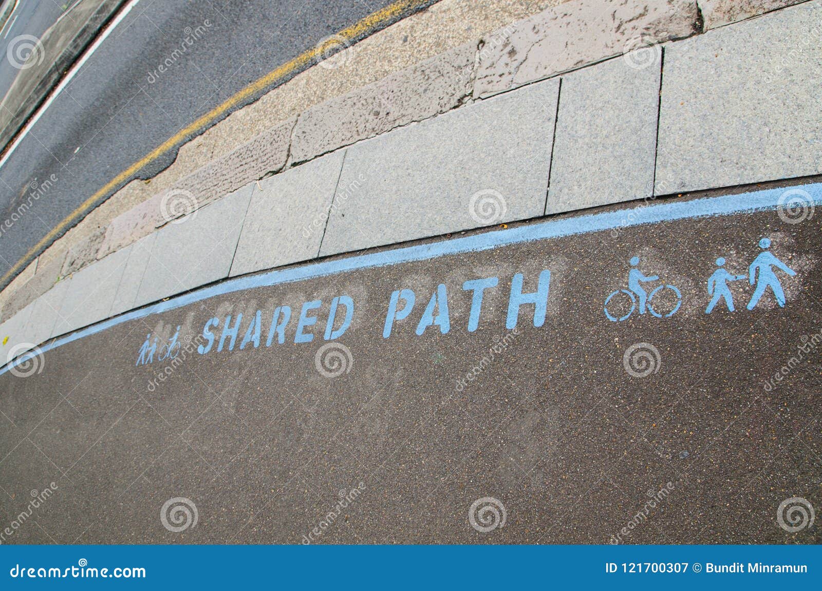 Shared Path Sign Planted on Footpath in Blue Color for Bicycle. Stock ...