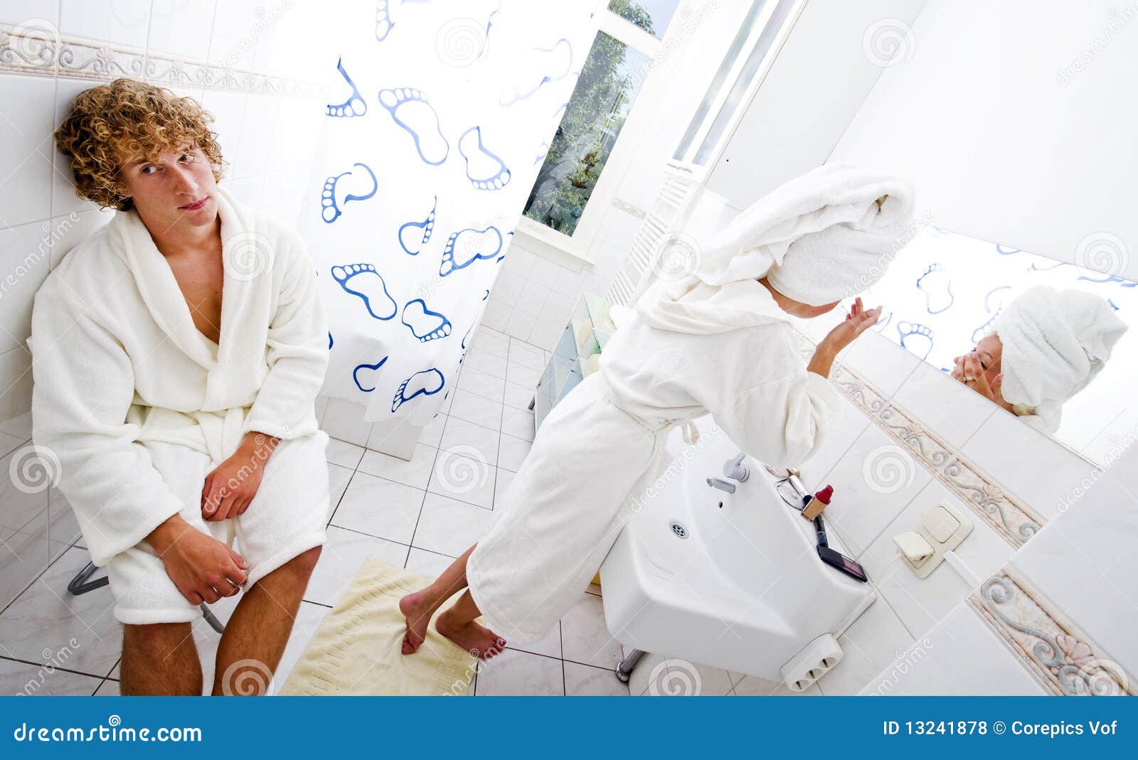 Sharing a bathroom stock photo. Image of mirror, bathroom - 13241878