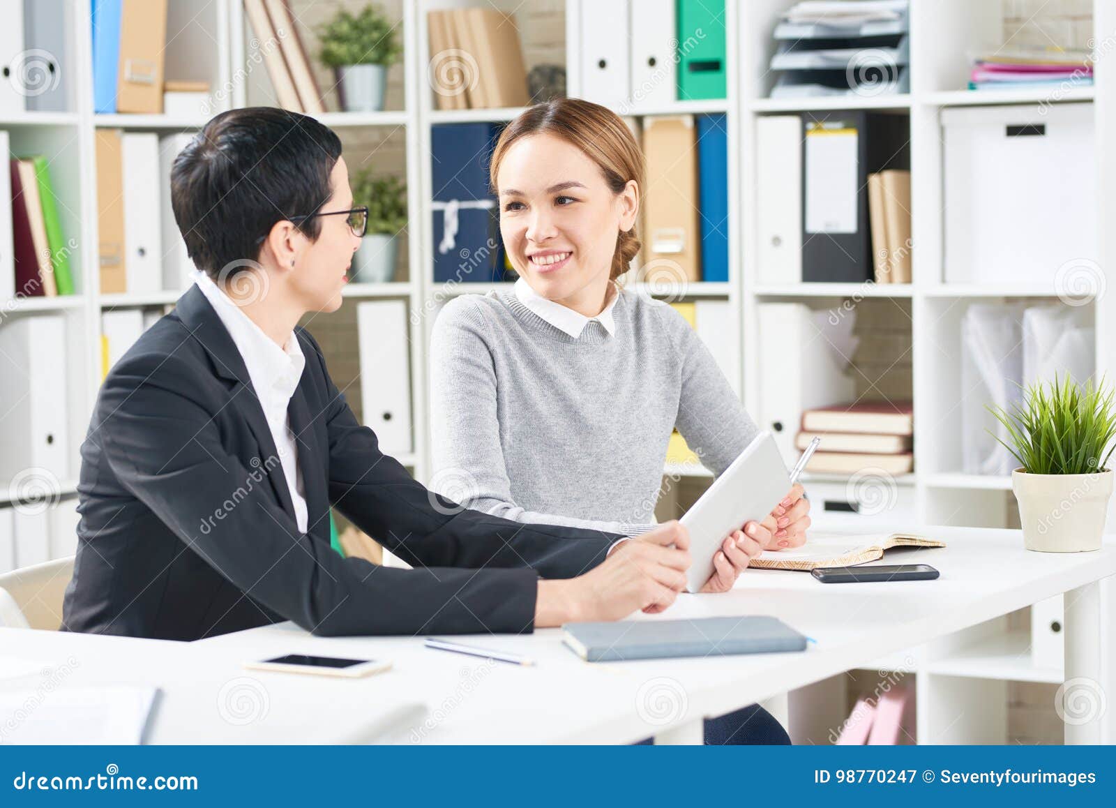 Sharing Creative Ideas with Coworker Stock Image - Image of pretty ...