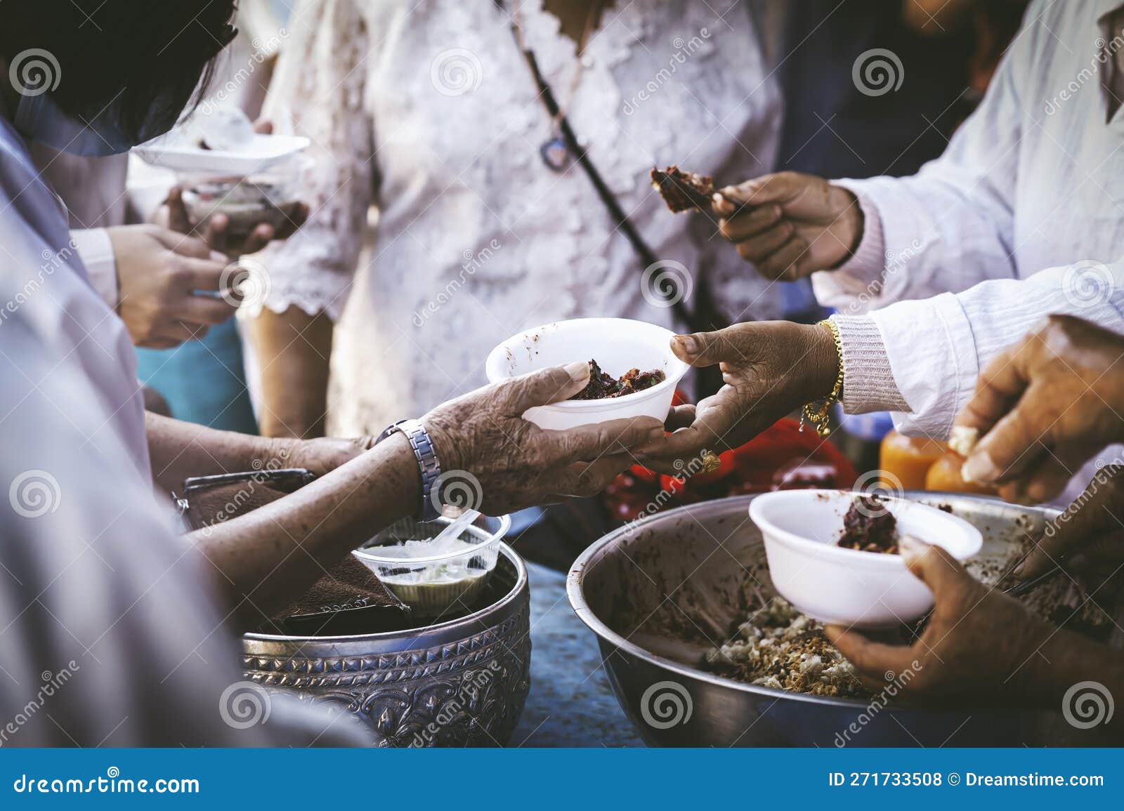 Sharing Food for the Poor. Humanitarian Aid through Free Feeding Stock ...