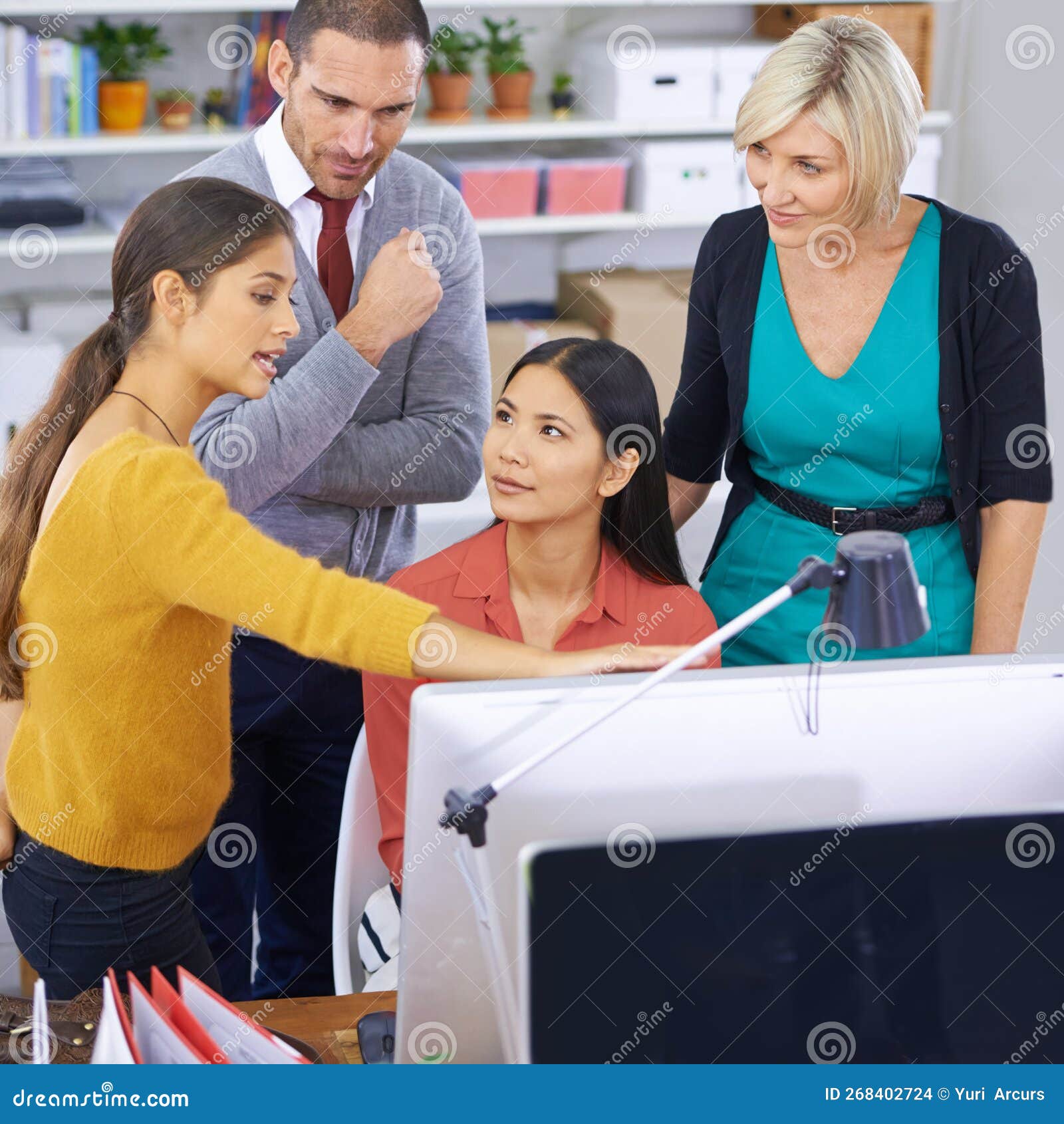 Sharing Ideas. a Group of Coworkers Working on a Computer. Stock Photo ...