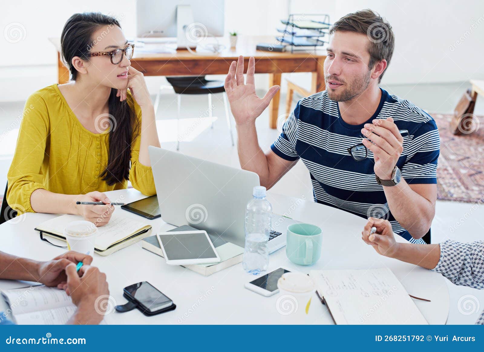 Sharing Ideas. a Group of Designers at Work in an Office. Stock Photo ...