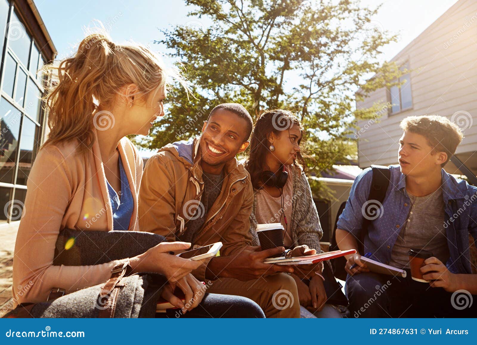 Sharing Knowledge and Information. a Group of Students Studying Outside ...