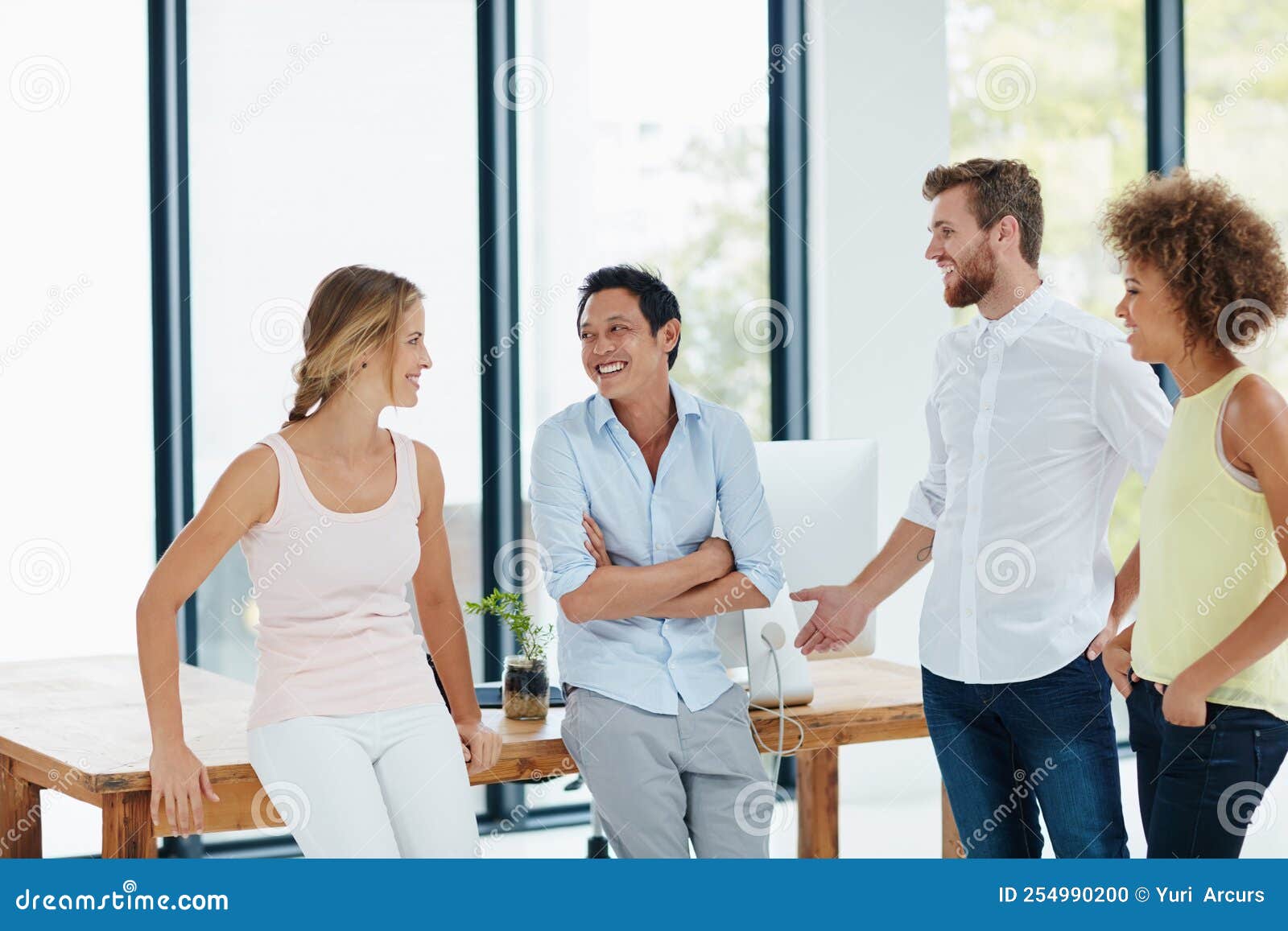 Sharing a Lighthearted Moment with Colleagues. a Group of Colleagues ...