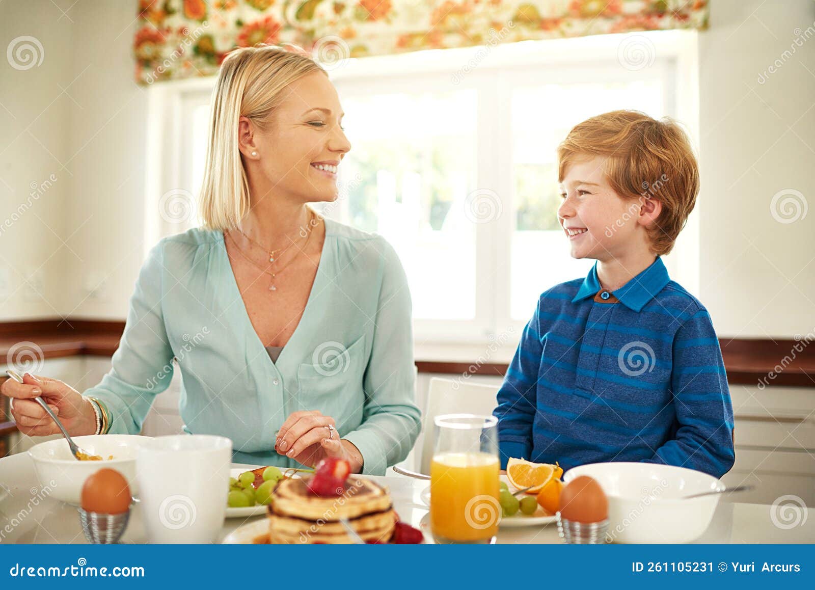 Sharing a Nutritious and Delicious Breakfast Together. a Mother and Son ...