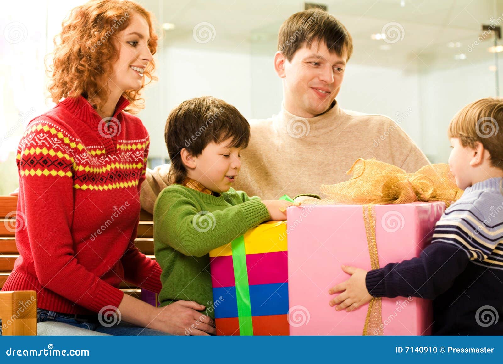 Sharing presents stock photo. Image of occasion, christmastime - 7140910