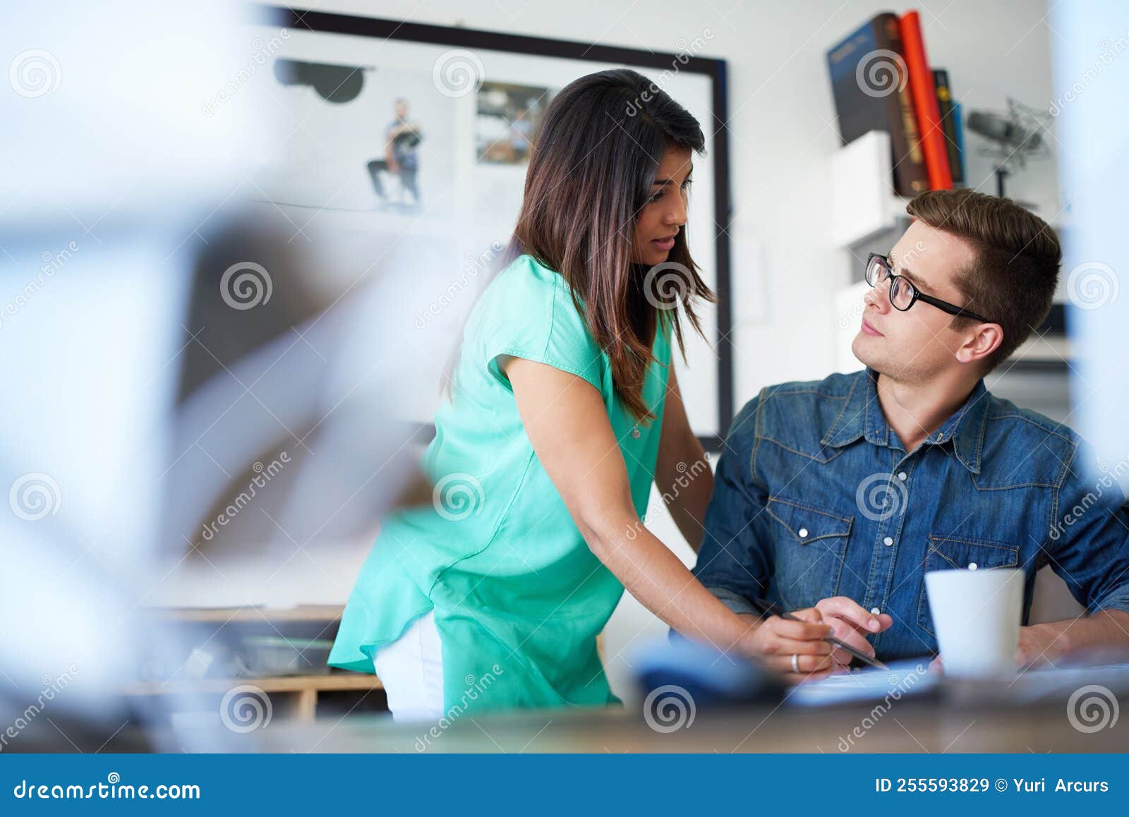 Sharing Some Insights with a Colleague. Two Designers Working Together ...