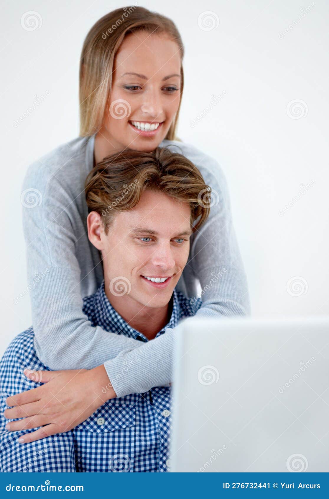 Sharing Their Love of Technology. a Young Couple Being Affectionate and ...