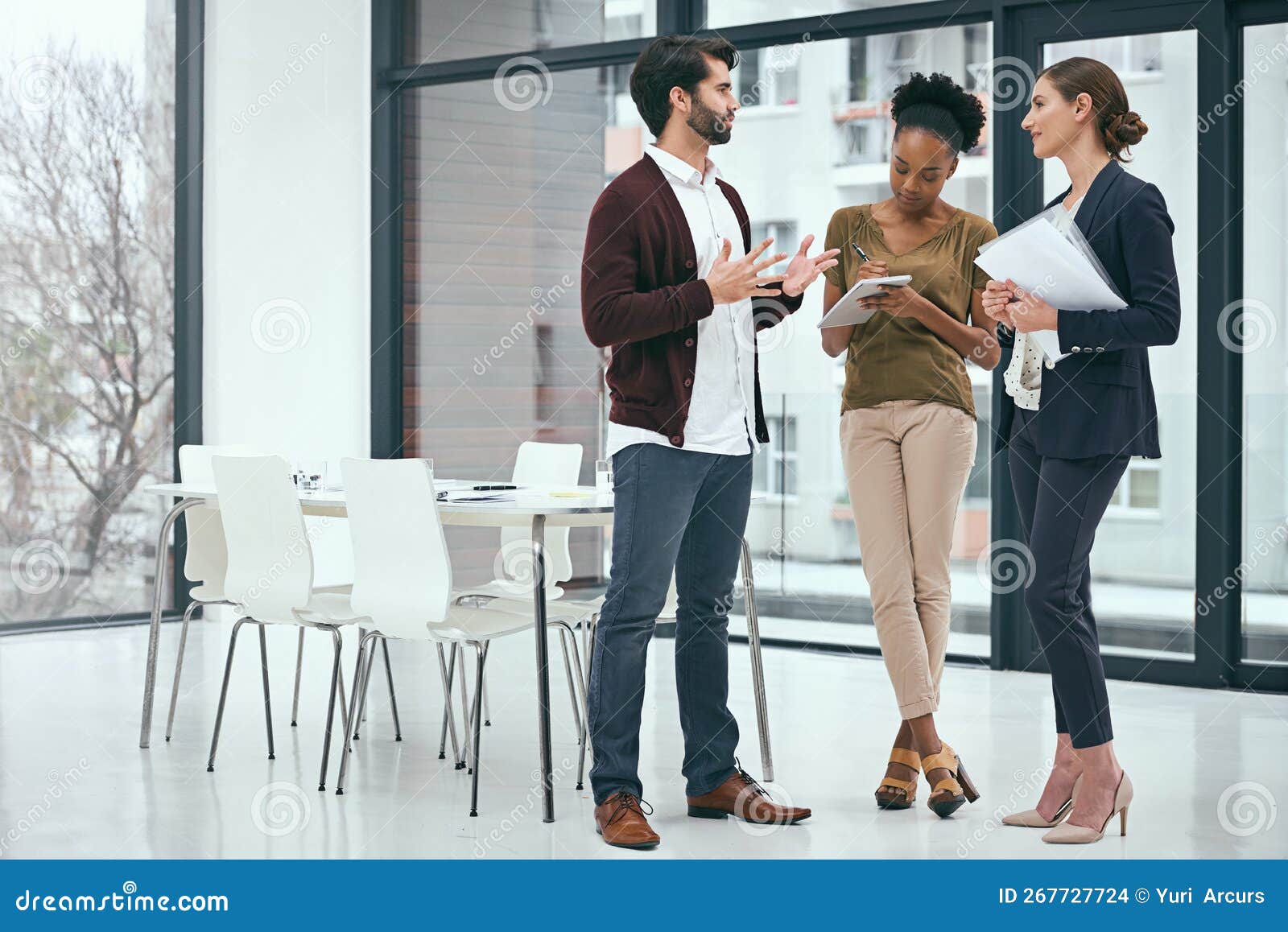 Sharing Updates on Their Latest Project. a Group of Colleagues Having a ...