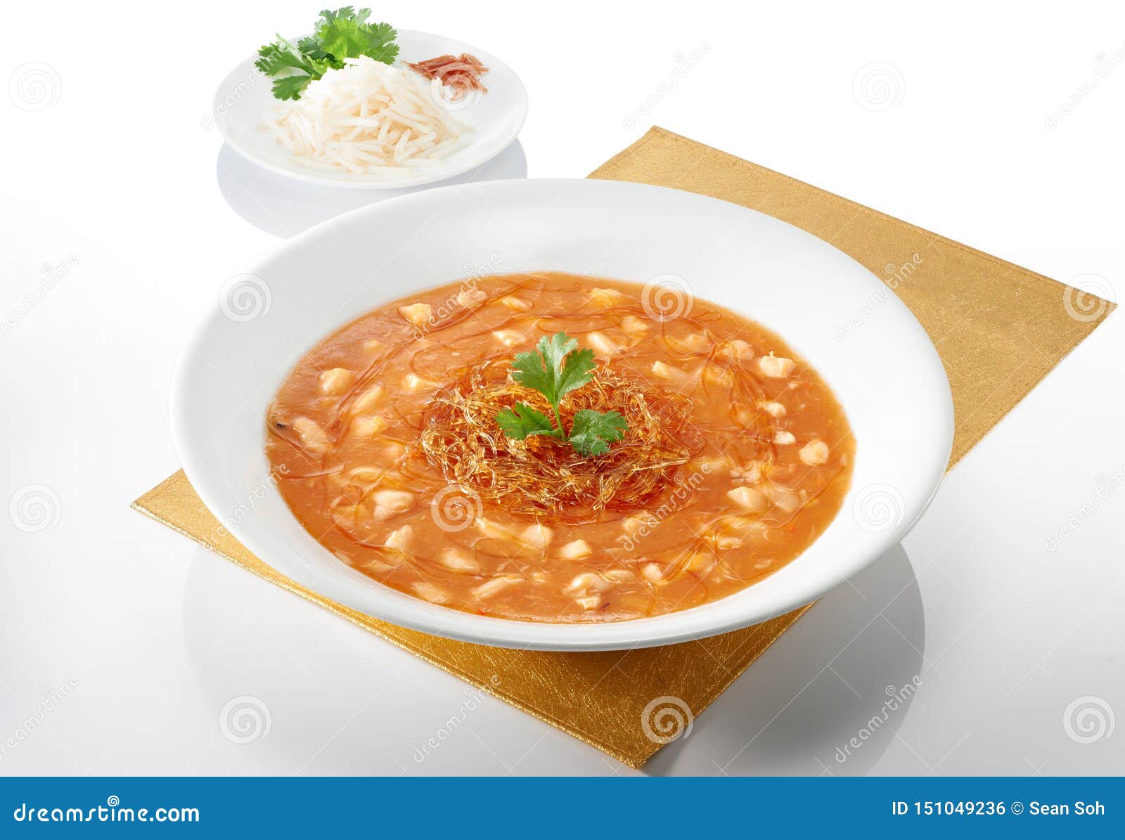 Shark Fin Soup with Gold Colour Table Mat Stock Photo - Image of white ...