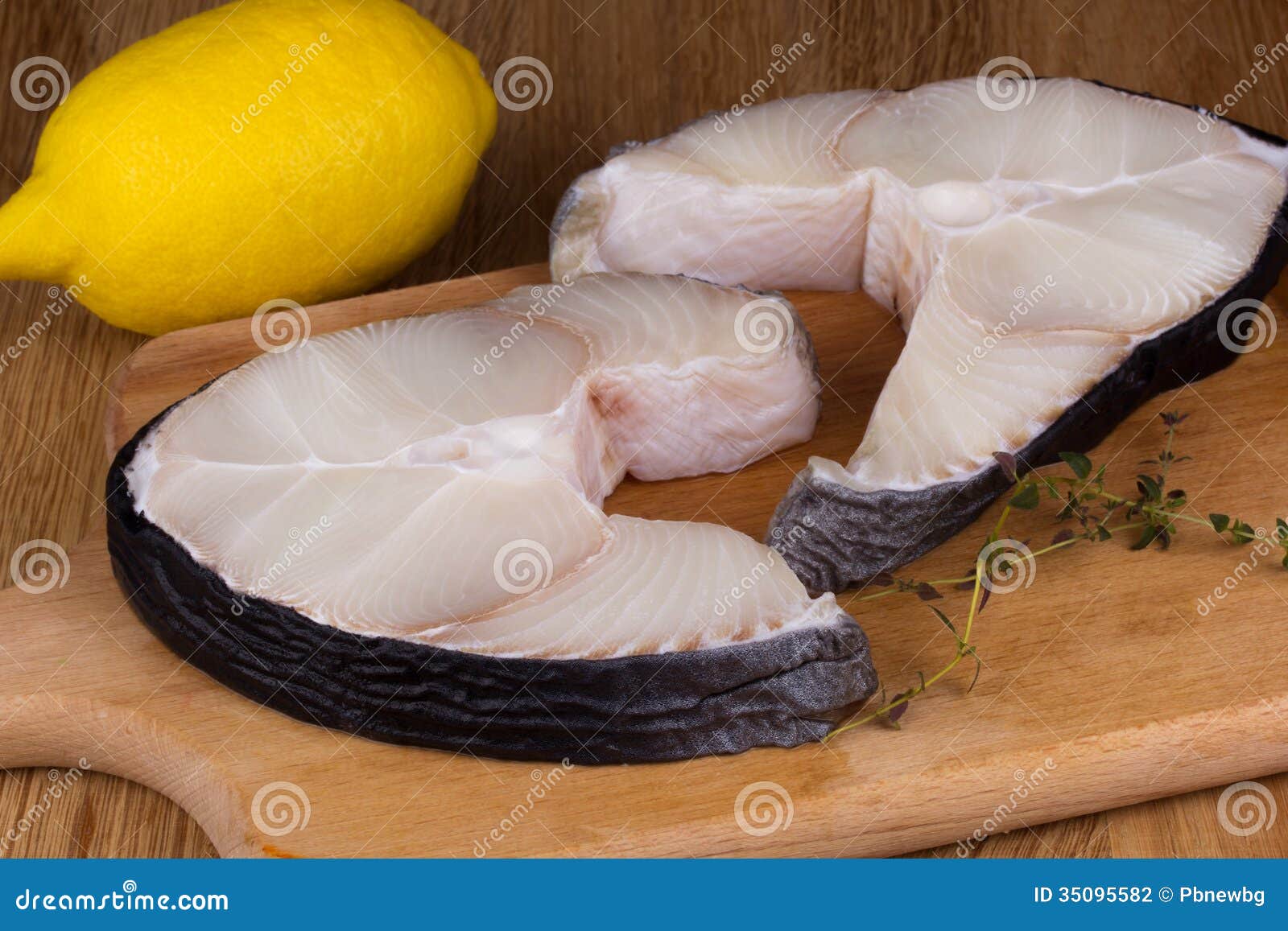 Shark Steak with Lemon on a Chopping Board Stock Photo - Image of diet ...