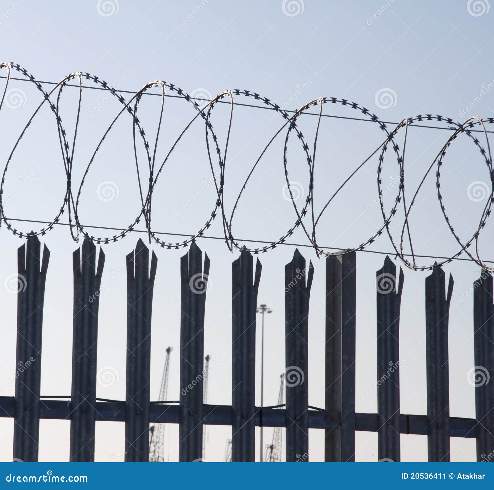 Sharp barbed wire spiral stock image. Image of prison - 20536411
