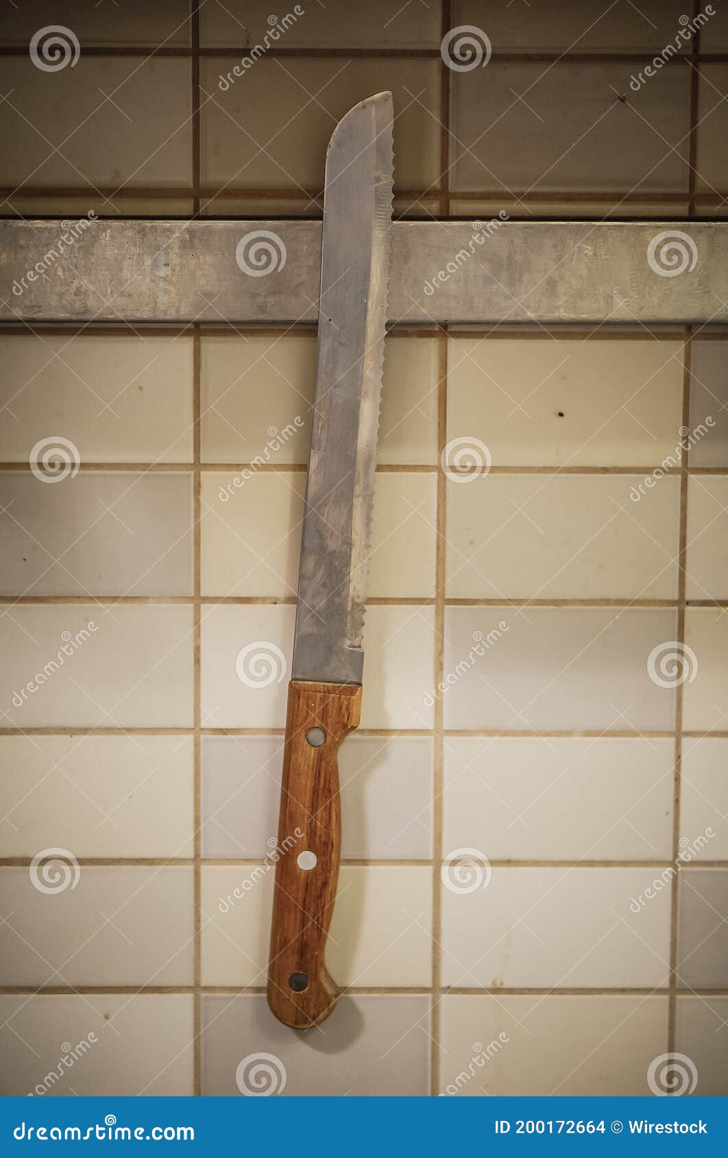 Kitchen Knife Hanging on a Wall Stock Photo - Image of hanging, metal ...