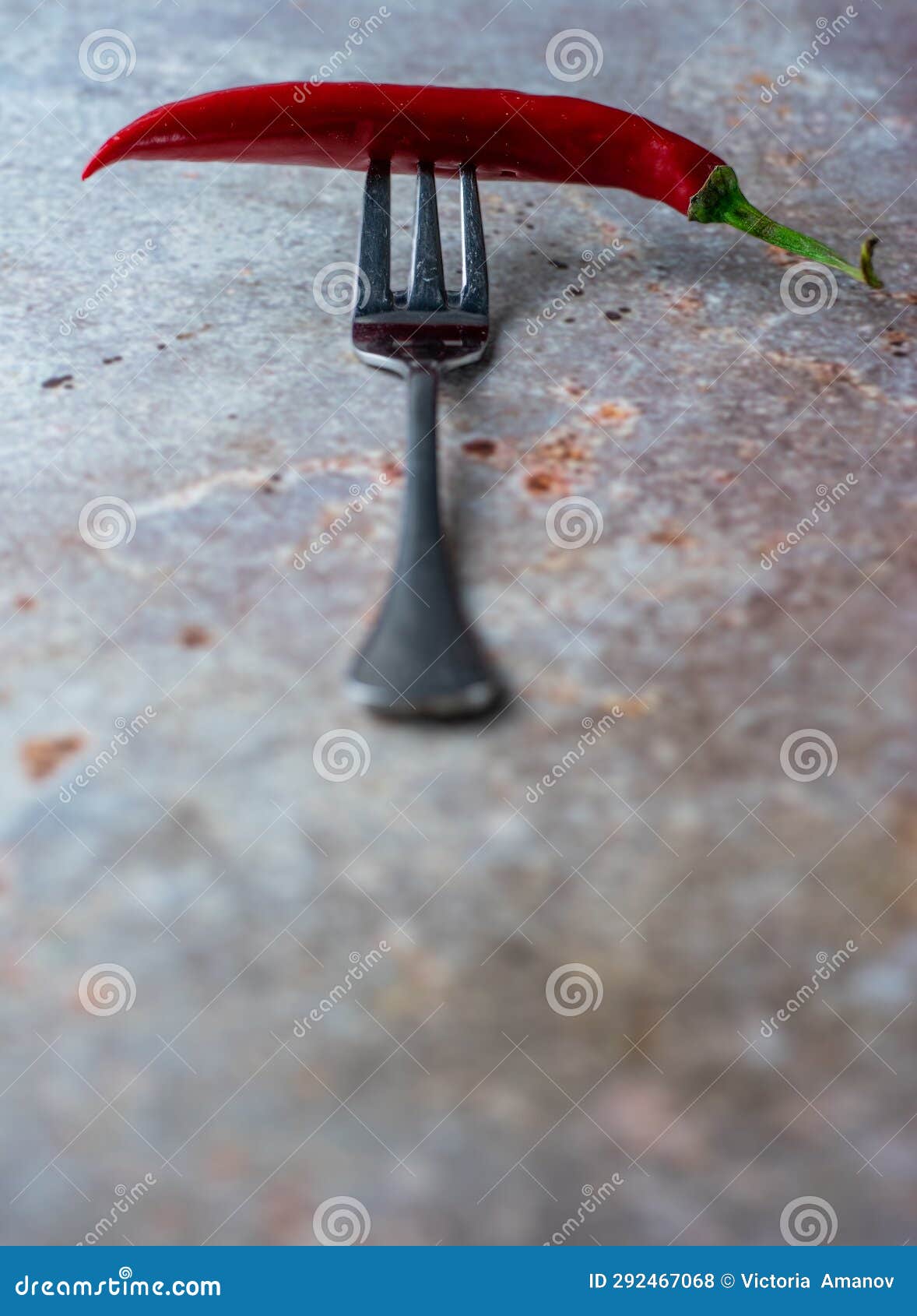Hot red pepper on a fork. stock photo. Image of food - 292467068