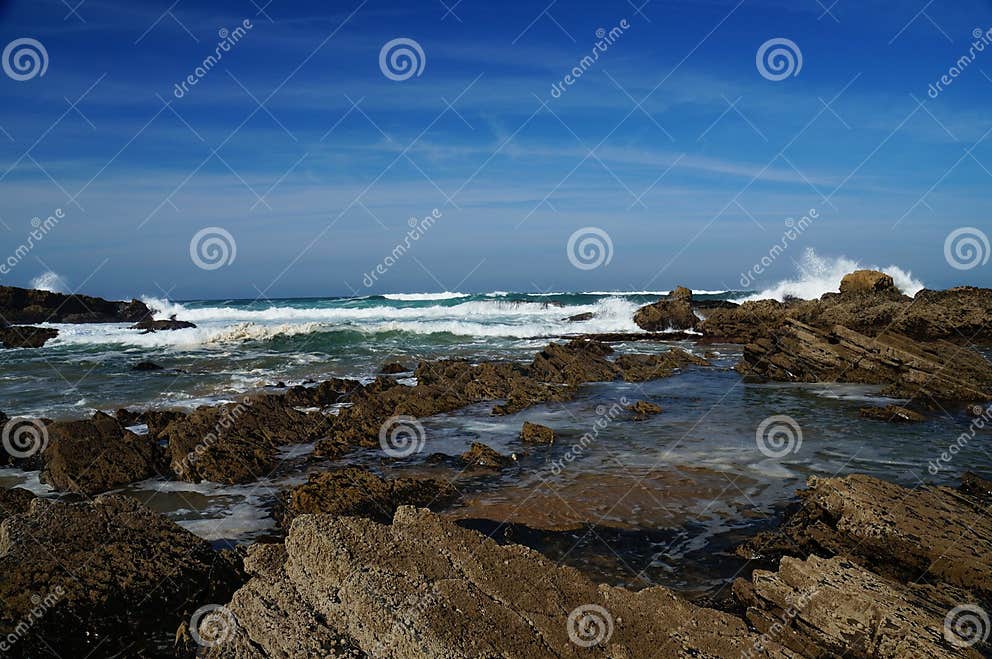 Sharp Edged Tilted Lava Rock Layers Exposed at Low Tide Stock Image ...