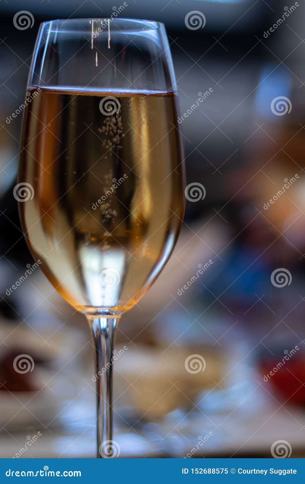 Sharp Focus on Single Wine Glass with White Wine Bubbling Stock Image ...