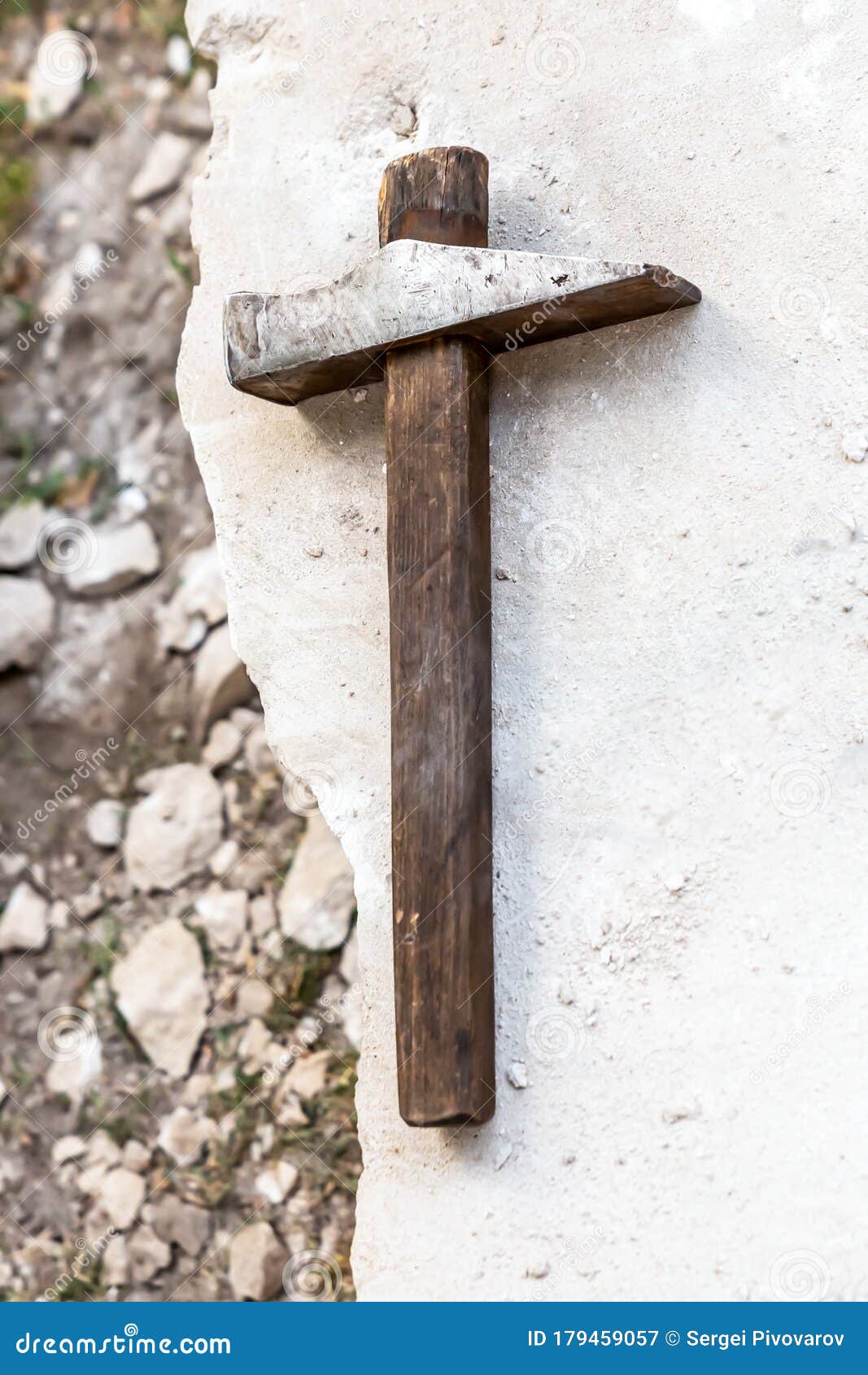 Sharp Gray Hammer Lies on a White Stone Background, the Extraction of ...