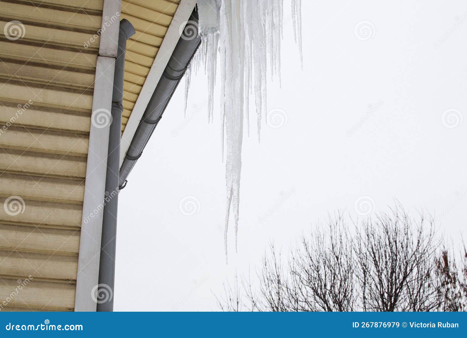 Sharp Icicles Hanging from Eaves of Roof Stock Image - Image of clear ...