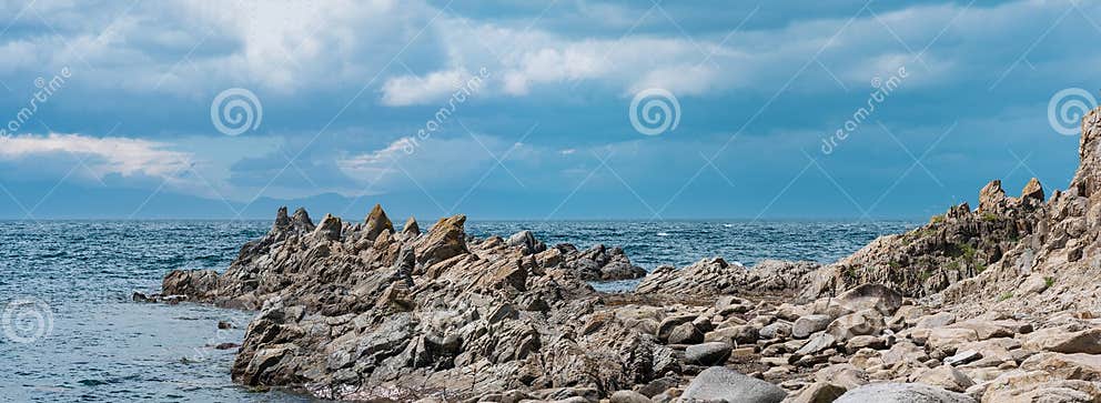 Sharp Jagged Basalt Rocks on the Sea Coast Stock Image - Image of ...