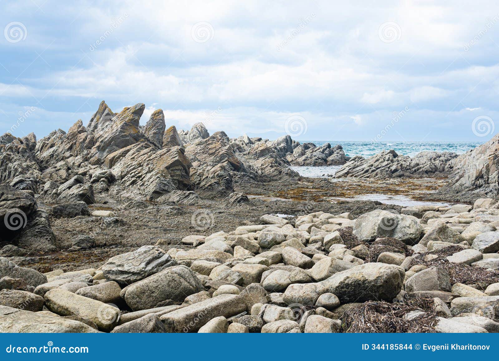 Sharp Jagged Basalt Rocks on the Sea Coast, Cape Stolbchaty on Kunashir ...