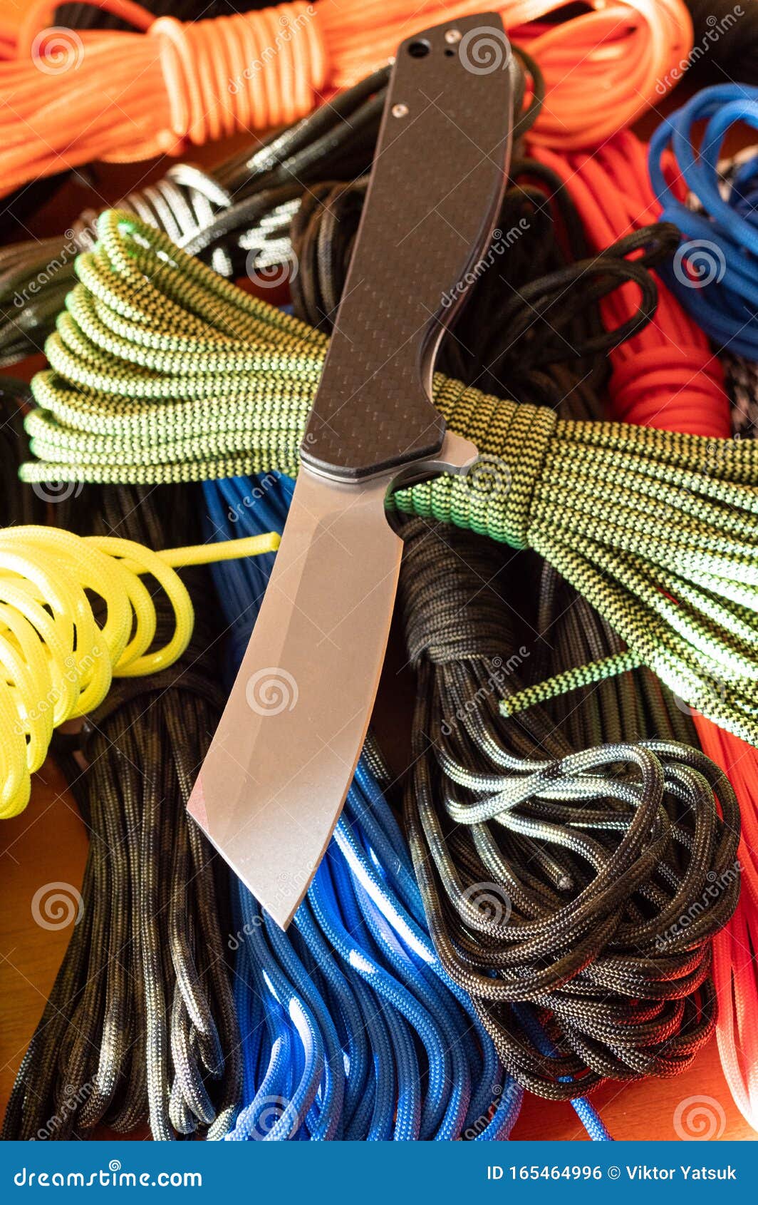 A Sharp Knife and a Rope. Cutting Tool Stock Photo - Image of blue ...