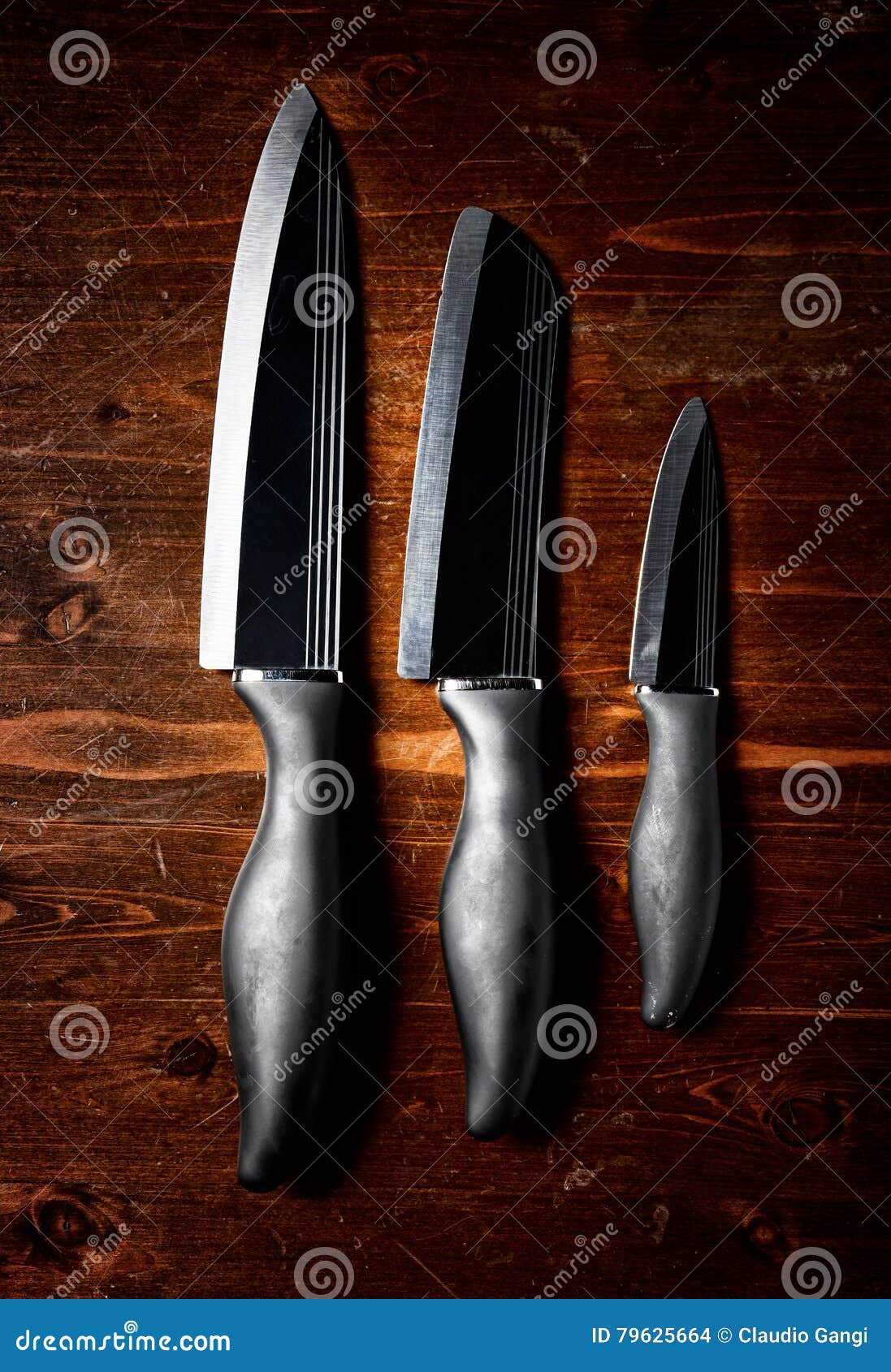 Sharp Knives on Dark Wooden Table Stock Photo - Image of backgrounds ...