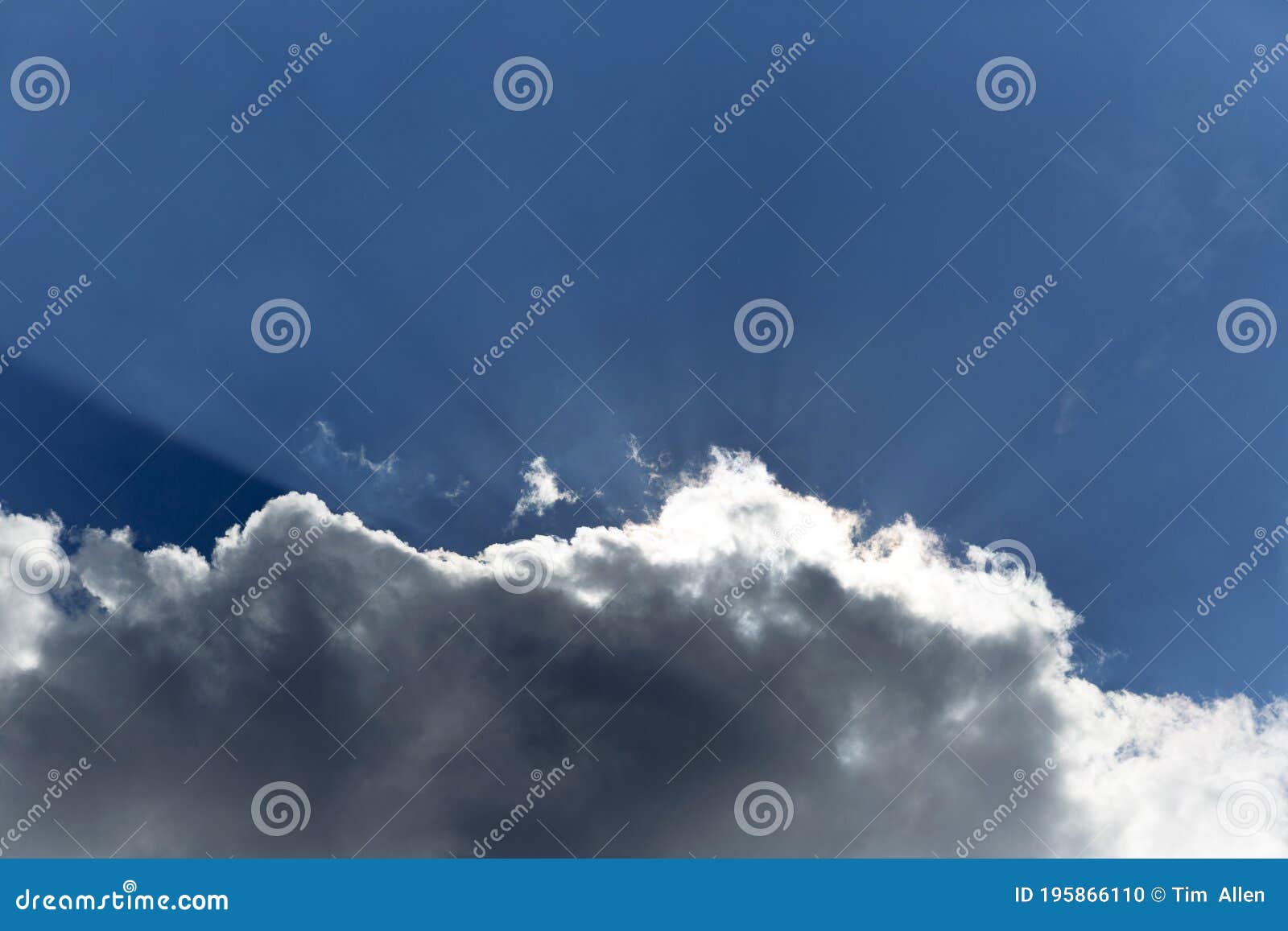 Sharp Light Beam Spreading from Behind Cloud Stock Photo - Image of ...