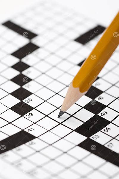 A Sharp Pencil on a Crossword Puzzle Stock Image - Image of white ...