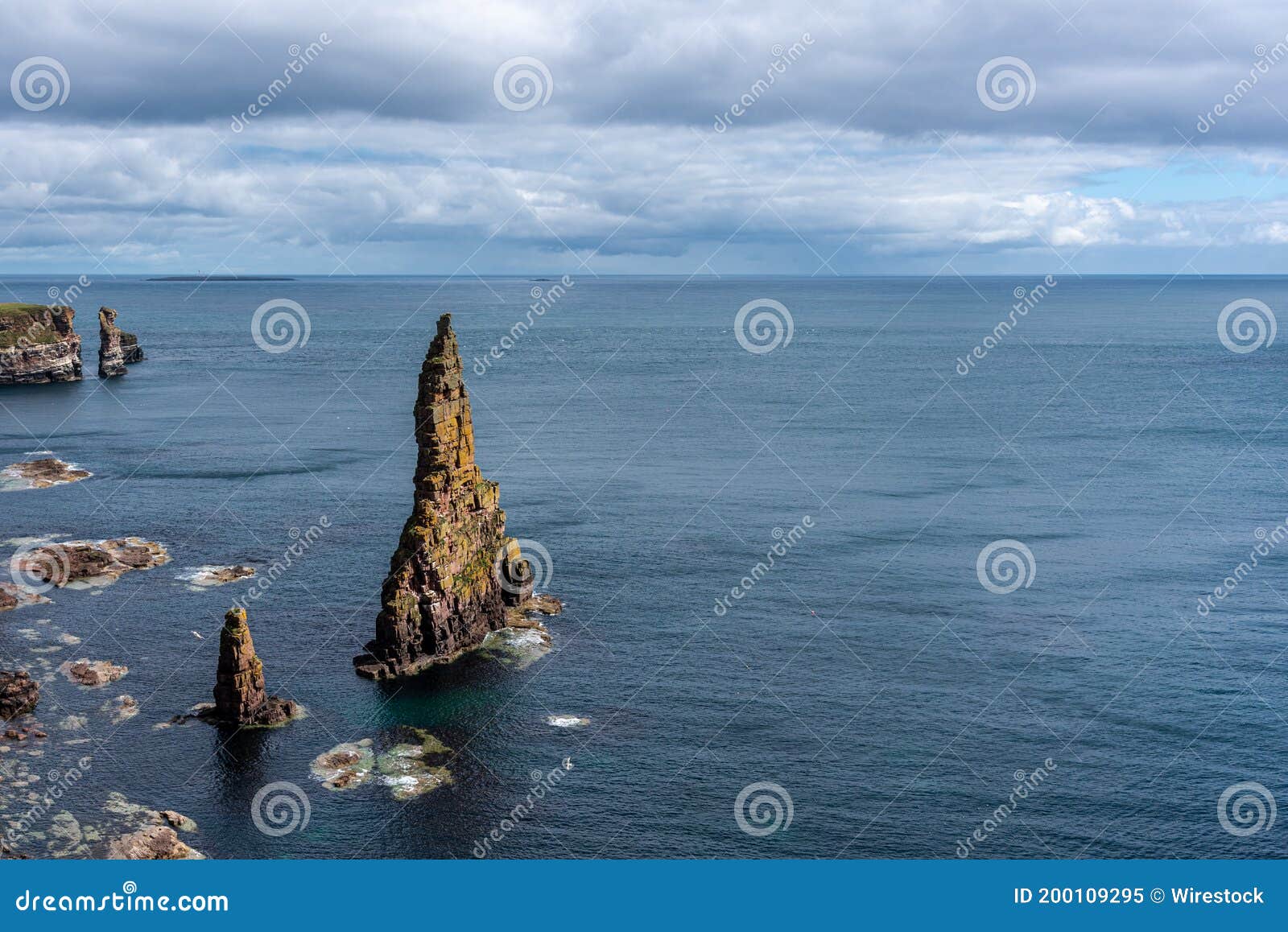 Sharp Rock Formations on the Coast of the Sea on a Gloomy Day Stock ...