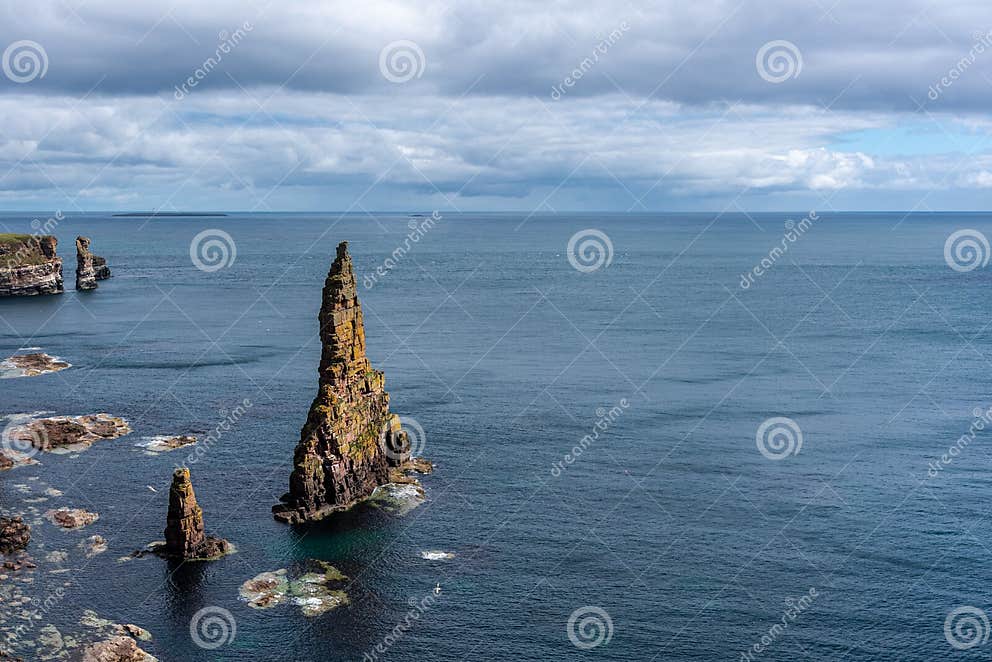 Sharp Rock Formations on the Coast of the Sea on a Gloomy Day Stock ...