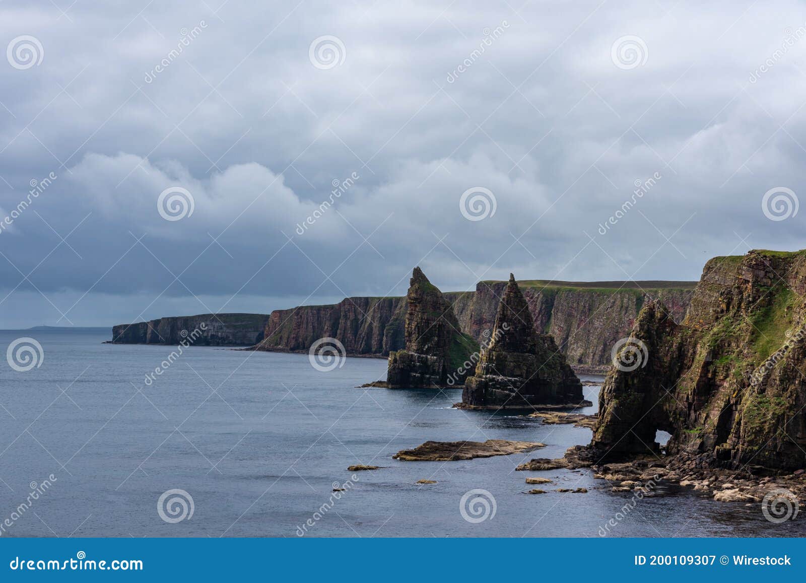 Sharp Rock Formations on the Coast of the Sea on a Gloomy Day Stock ...