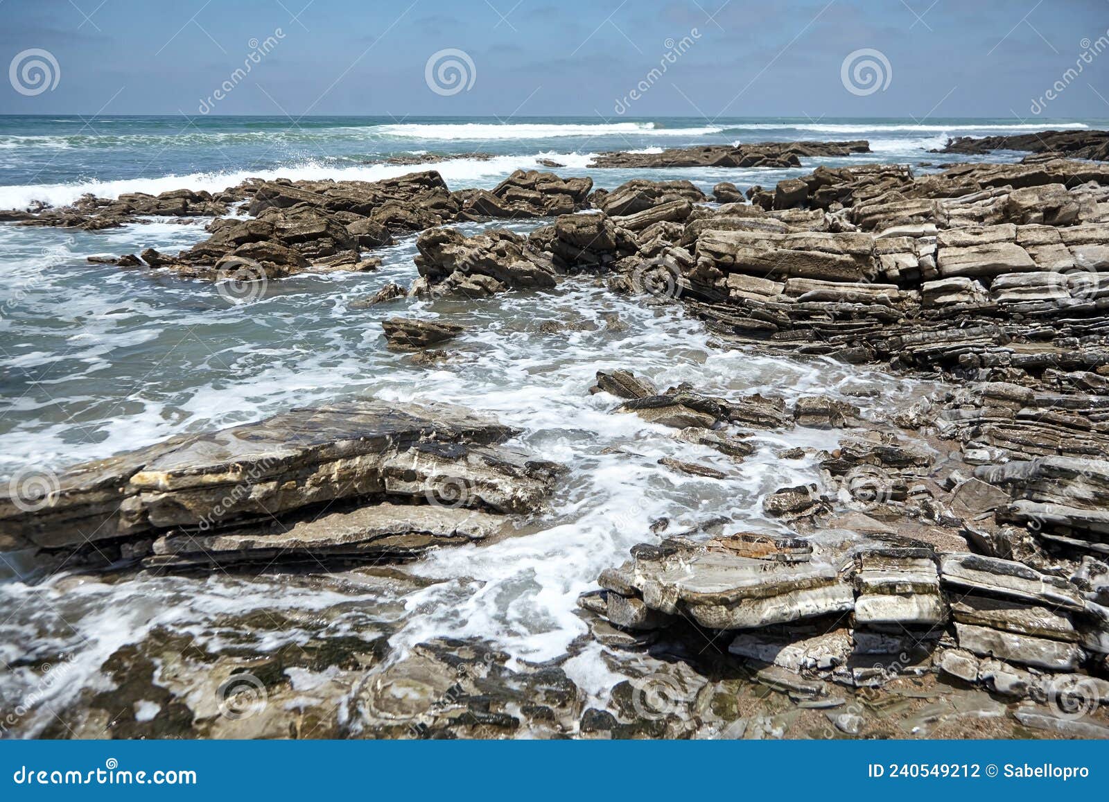 Sharp Rocks on Ocean Coast. Stones and Water Stock Photo - Image of ...