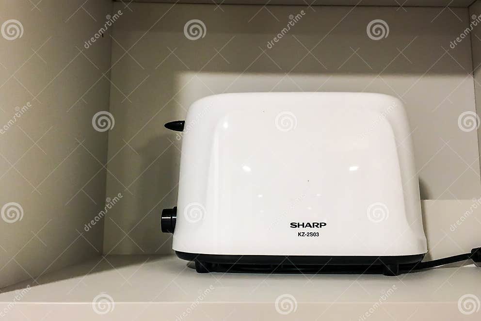Sharp`s White Electrical Toaster Inside the Kitchen on the Shelf ...