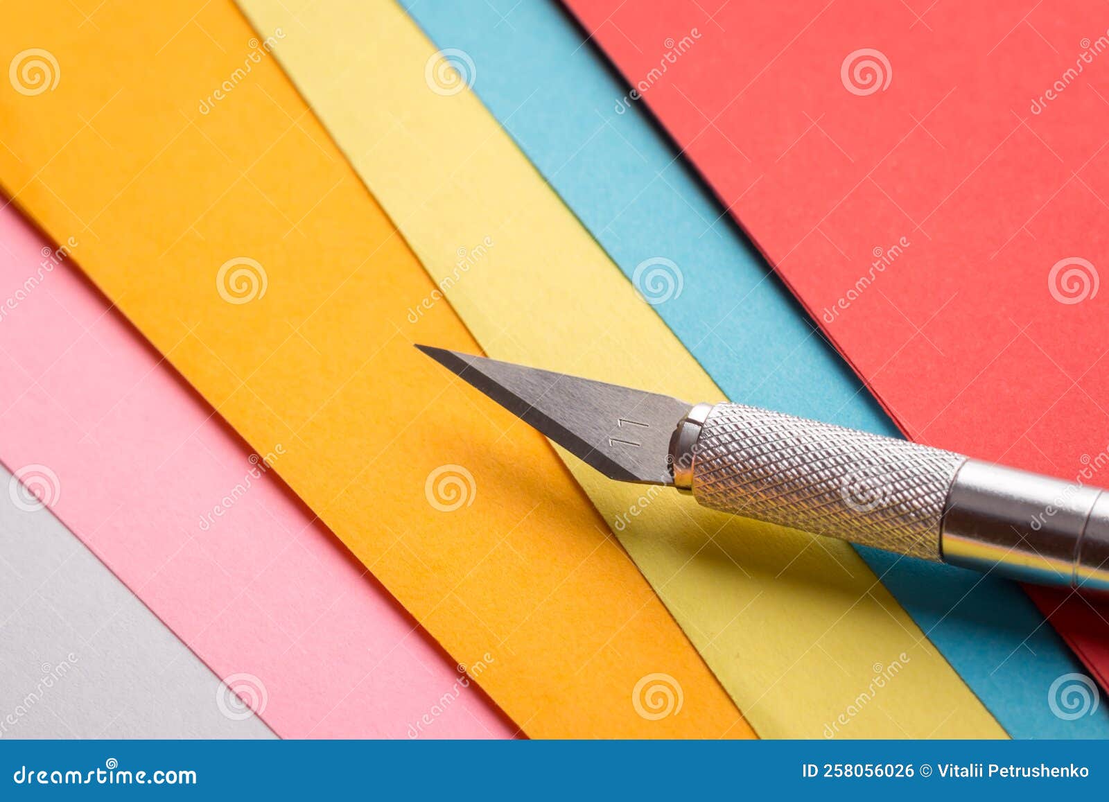 Sharp scalpel on papers stock photo. Image of mockup - 258056026