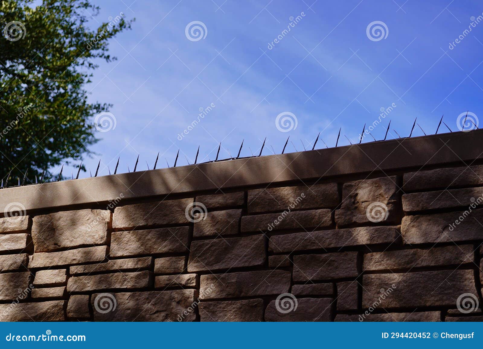 Sharp Spike on the Wall To Prevent Illegal Enter Stock Photo - Image of ...