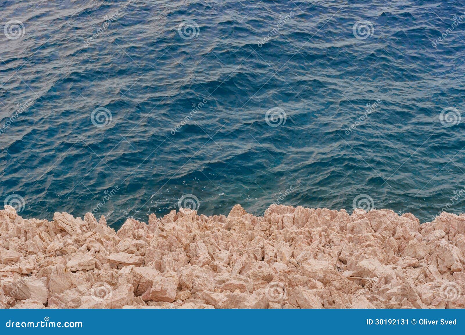 Sharp stones at the shores stock image. Image of strong - 30192131