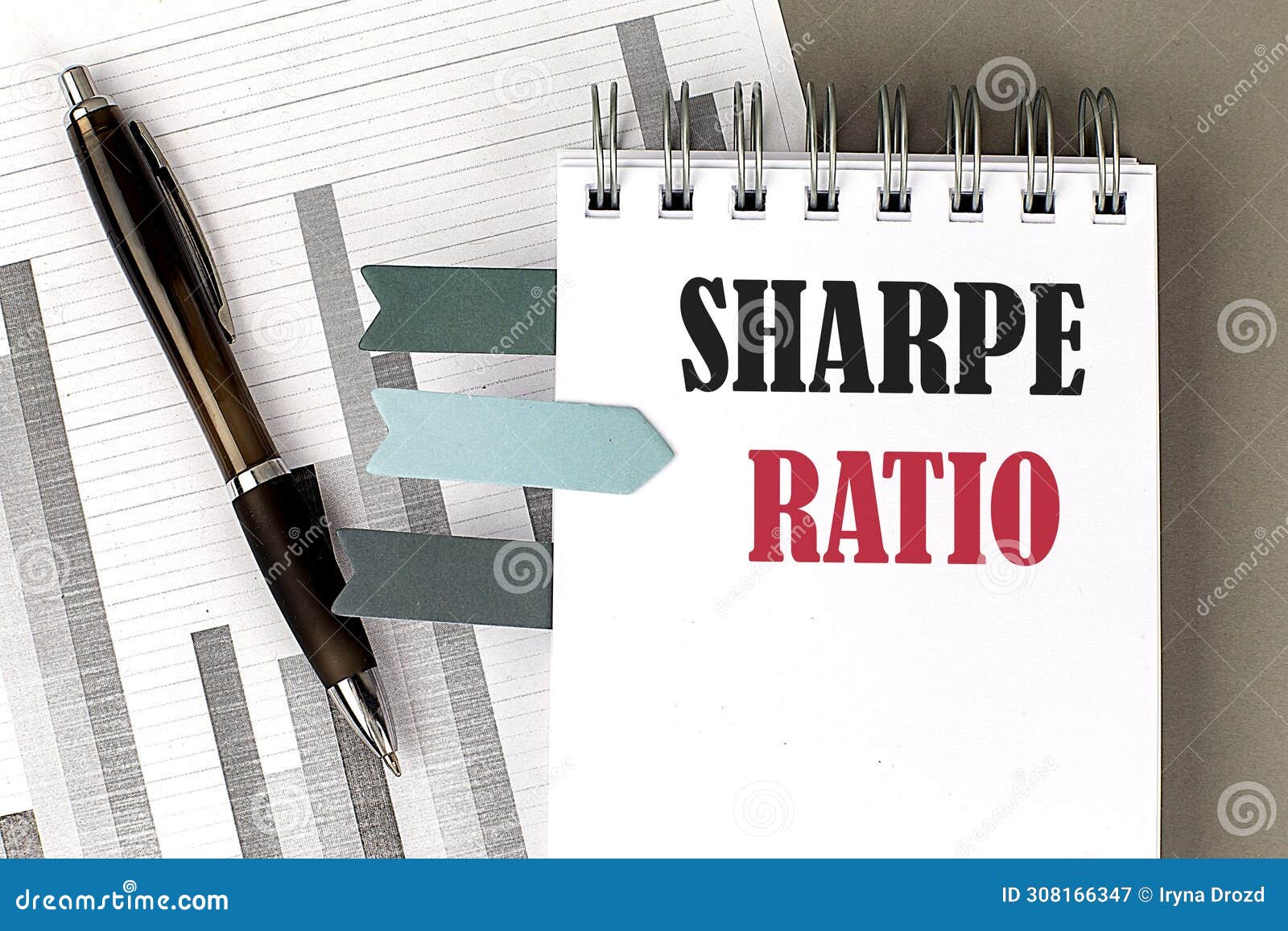 SHARPE RATIO Text on Notebook with Pen, Calculator and Chart on a Grey ...