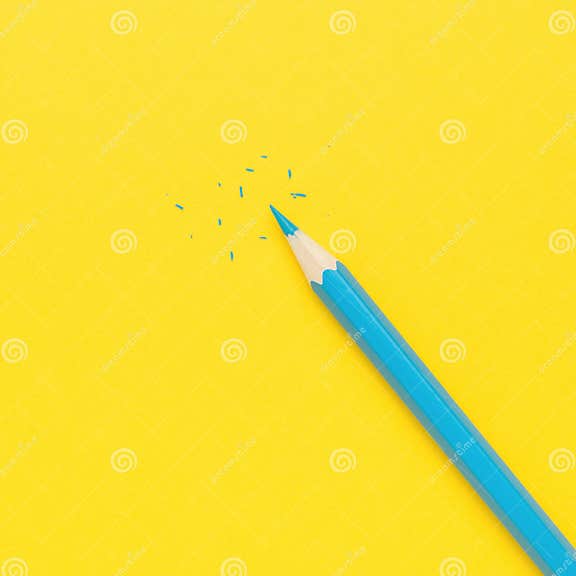 Sharpened Blue Pencil on a Light Yellow Background Stock Image - Image ...