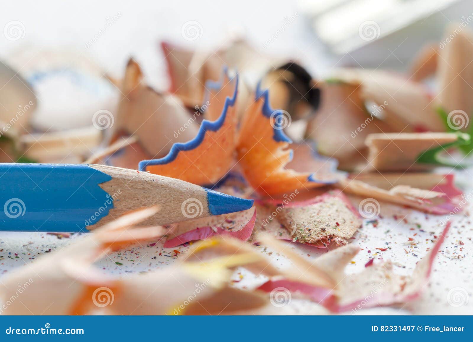 Sharpened Blue Pencil on White Paper Stock Image - Image of chips ...