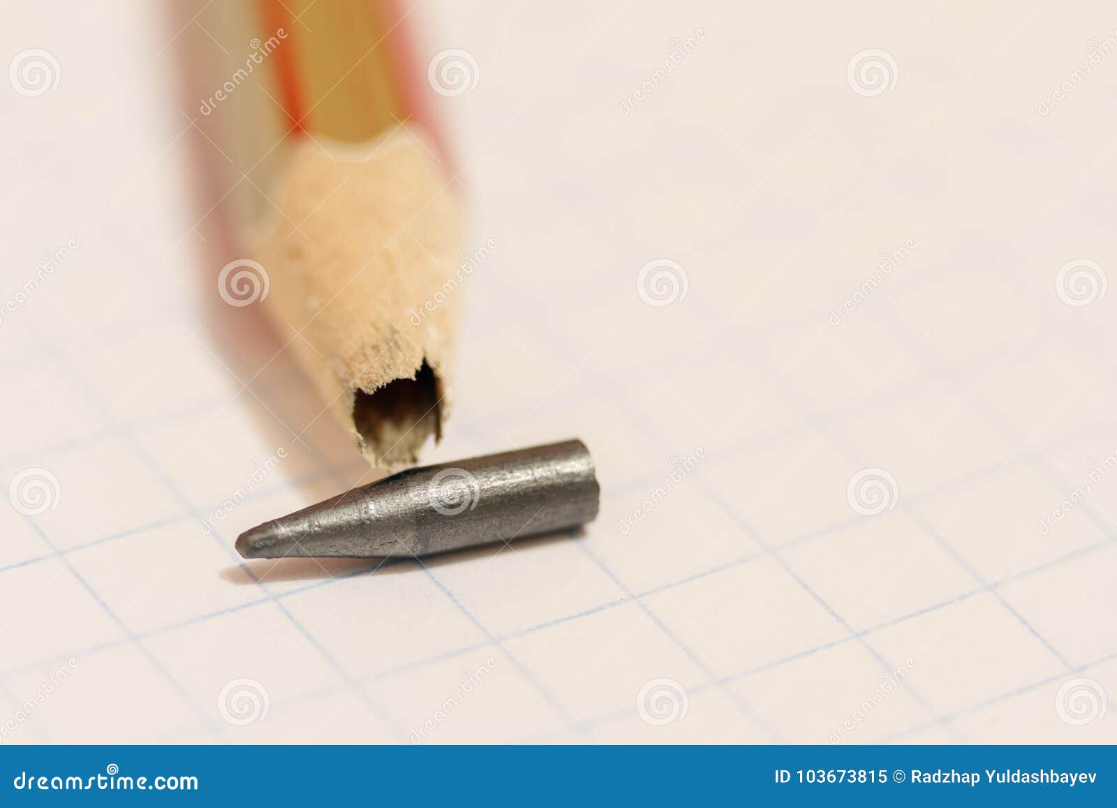 Sharpened Pencil with a Broken Tip Over a Blank Sheet of Paper Stock ...